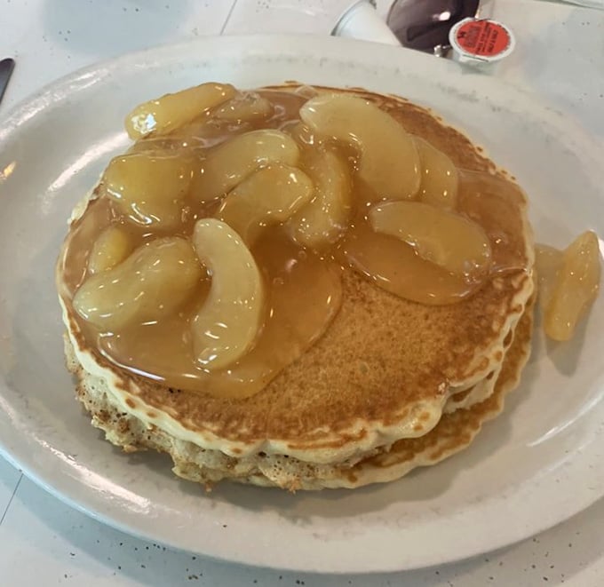 When regular pancakes just won't cut it, order the stack that requires architectural planning to consume properly.
