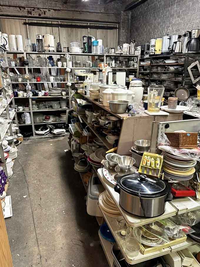 Kitchen essentials crowd every surface, from coffee makers to mixing bowls, ready to equip your culinary adventures.