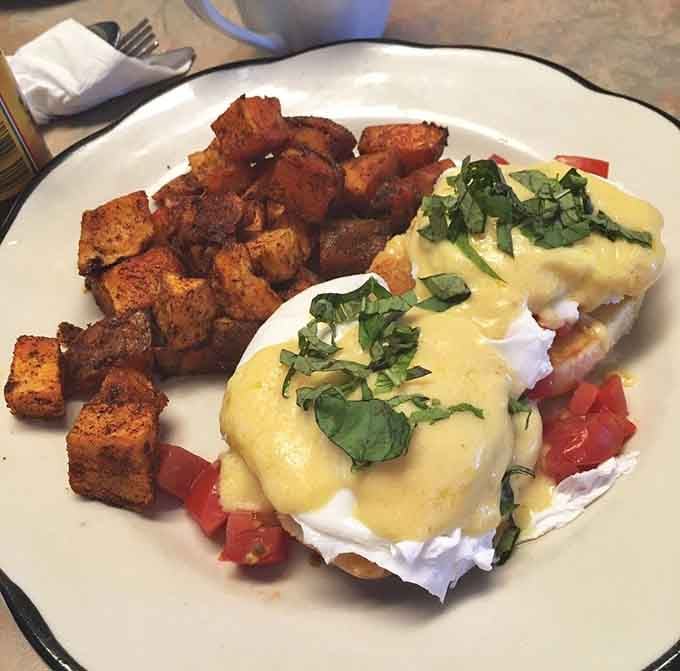 That hollandaise sauce draped over perfectly poached eggs with fresh basil will haunt your dreams in the best way.