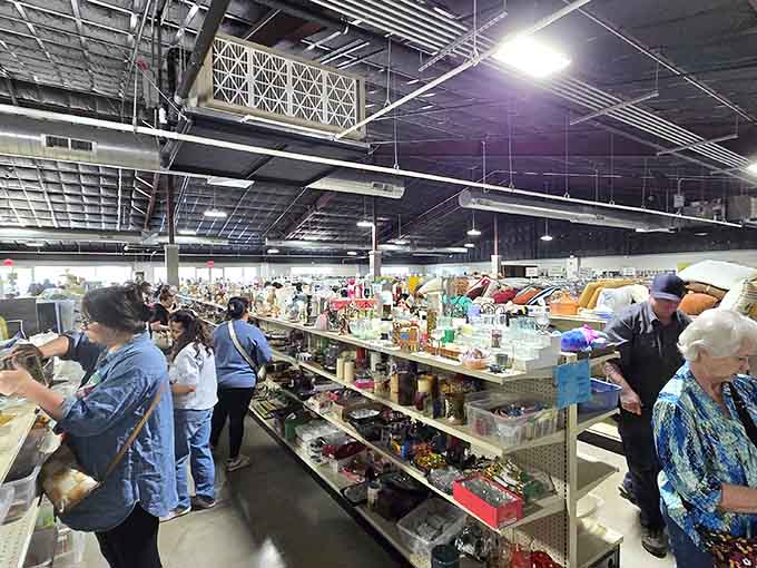 Fellow treasure hunters navigate the aisles like it's Black Friday, except everyone's calm and actually enjoying themselves here.
