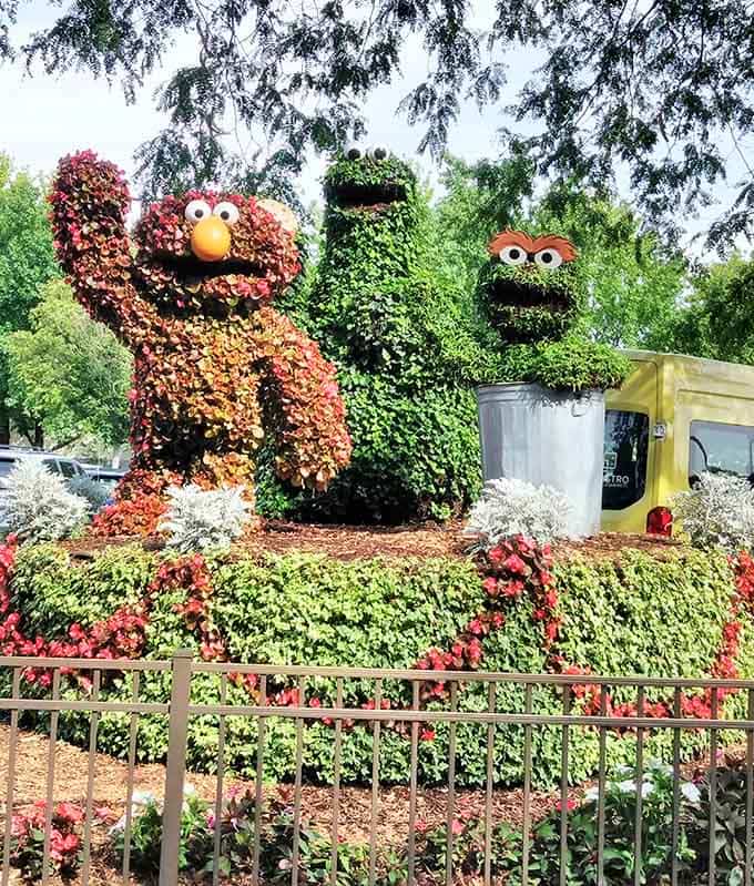 Living topiaries of Elmo and Oscar prove that even grouches can appreciate good landscaping.