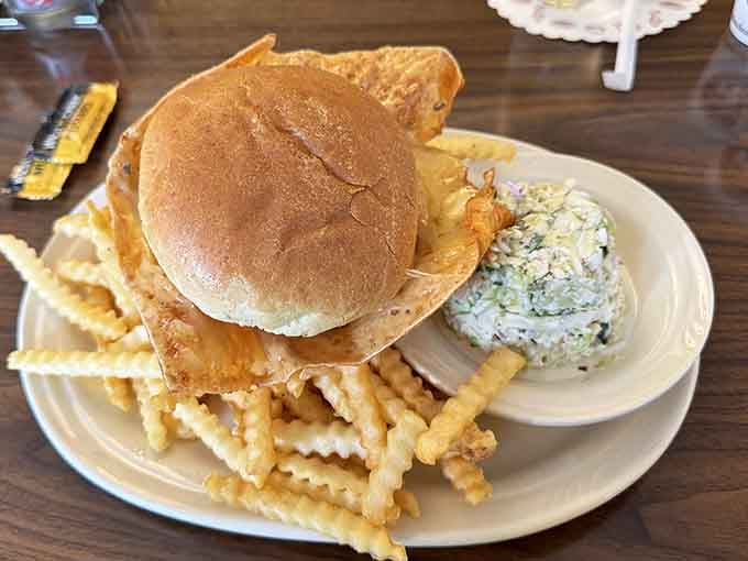 The coleslaw knows its supporting role, but those cheese wings are stealing the show like always.