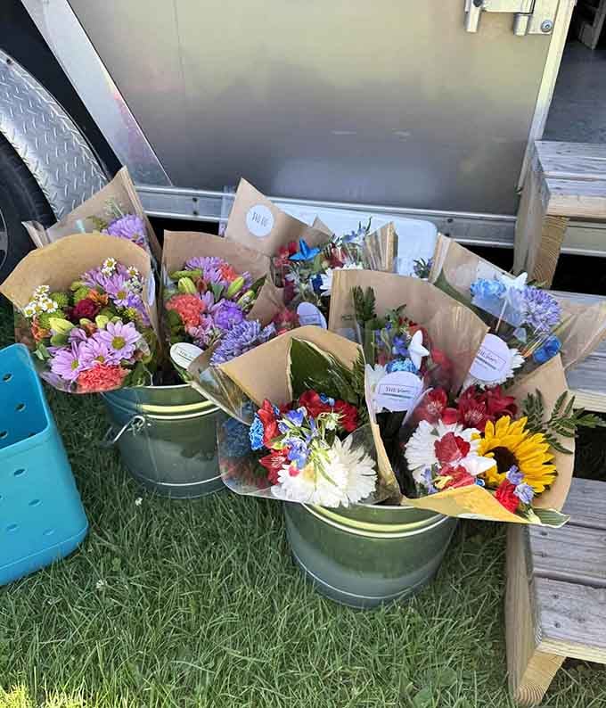Fresh flower bouquets add a splash of natural beauty to your treasure hunting adventure at the market.