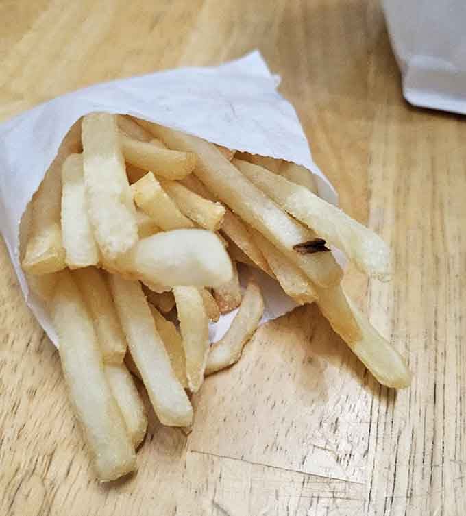 Golden, crispy fries that disappear faster than your willpower, and that's perfectly okay with everyone involved.