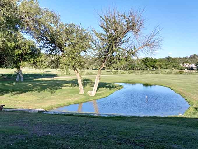 Green fairways stretch across the landscape, offering golfers views that almost make up for missed putts.