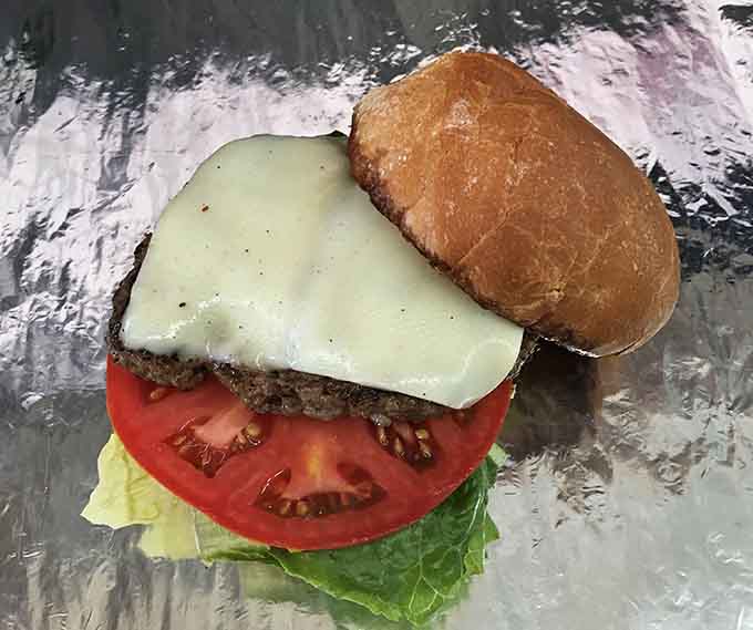 Sometimes perfection is just a perfectly melted slice of cheese on a hand-formed patty with fresh toppings.