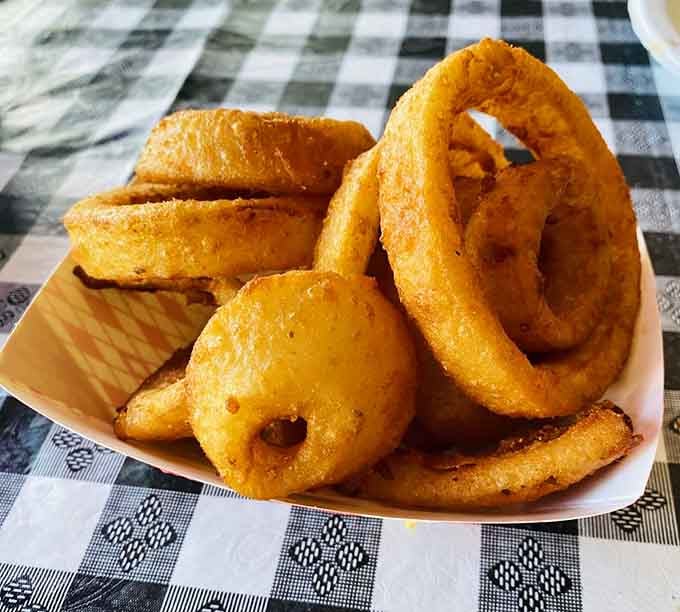 Onion rings this perfectly golden deserve their own standing ovation and possibly a trophy case too.