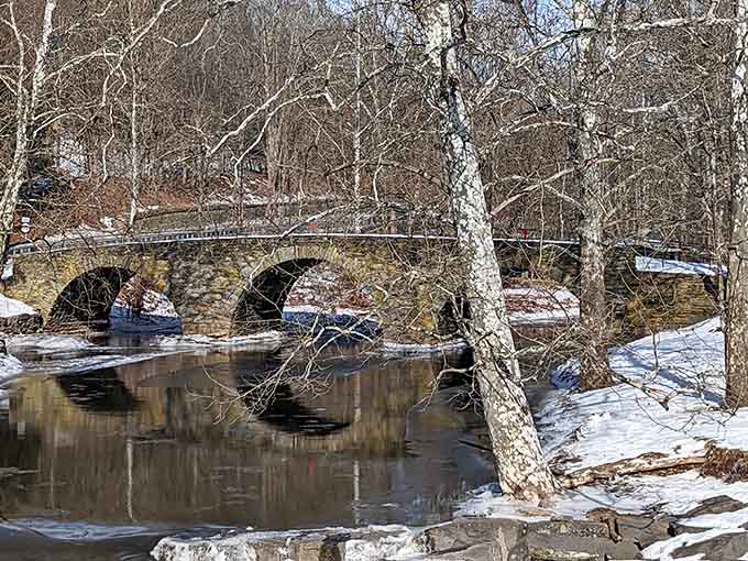Winter transforms the bridge into something from a Currier and Ives print, minus the horse-drawn sleighs but equally charming.