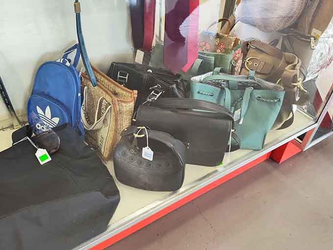 Designer bags rubbing elbows with everyday purses, because everyone deserves a little luxury in their life.