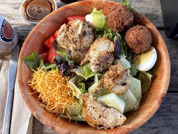 When your salad comes in a wooden bowl and includes fried everything, you've found the perfect nutritional loophole.