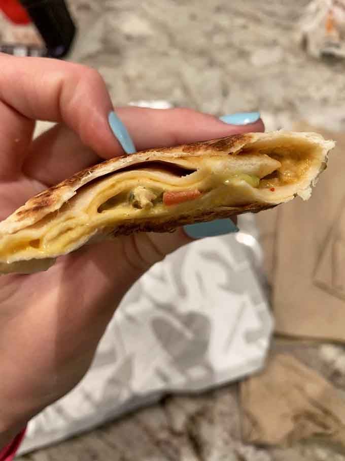 The Chicken Quesarito with guacamole, a burrito wrapped in a quesadilla, because why choose one?