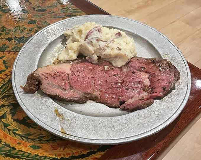 Prime rib sliced thick with creamy mashed potatoes, proving that simple done right beats fancy every single time.