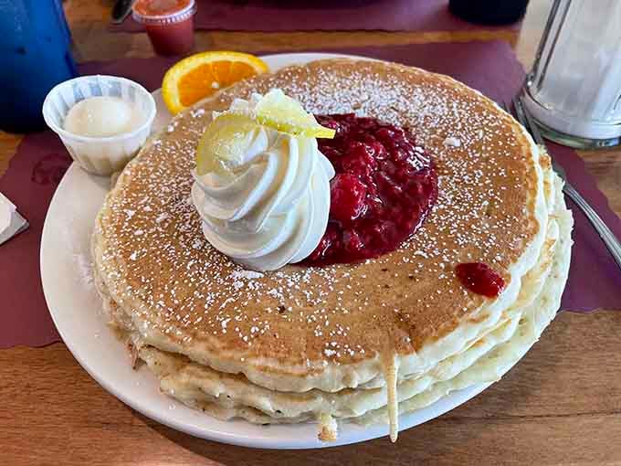 These pancakes are so fluffy they could double as pillows, if pillows were delicious and covered in powdered sugar.