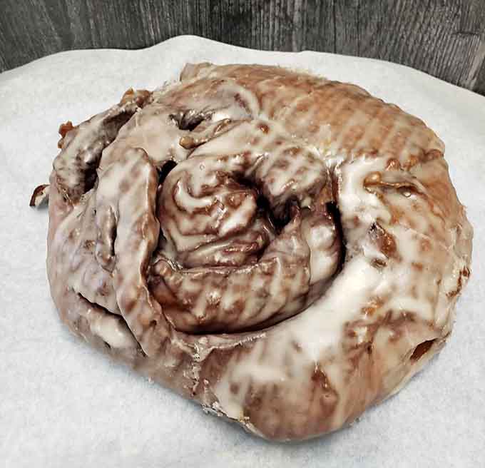 This cinnamon bun could double as a throw pillow, except eating furniture is generally frowned upon by society.