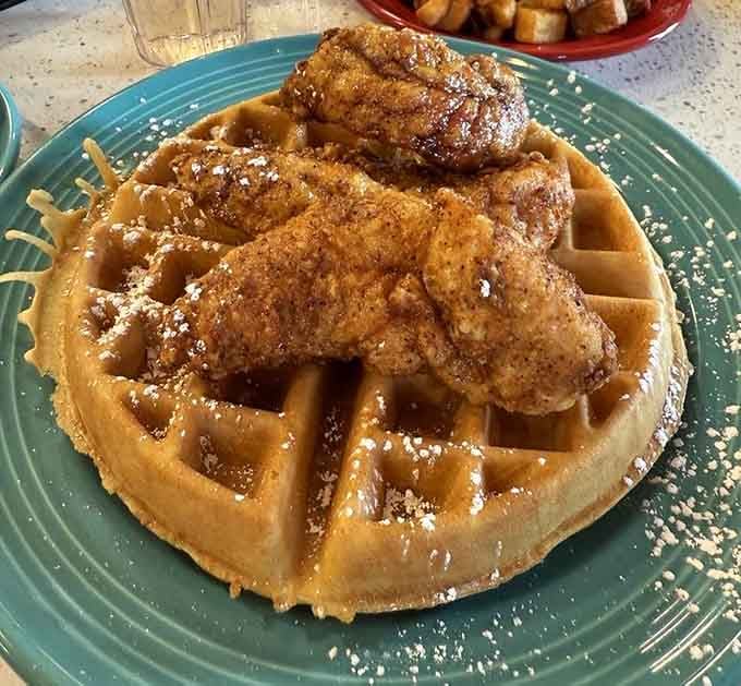 Crispy fried chicken perched atop a waffle creates the sweet-savory harmony that makes breakfast lovers swoon with joy.