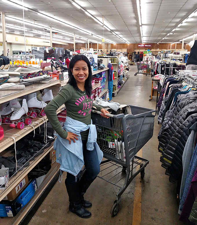 That shopping cart smile says it all: discovering deals this good feels better than finding money in old jeans.