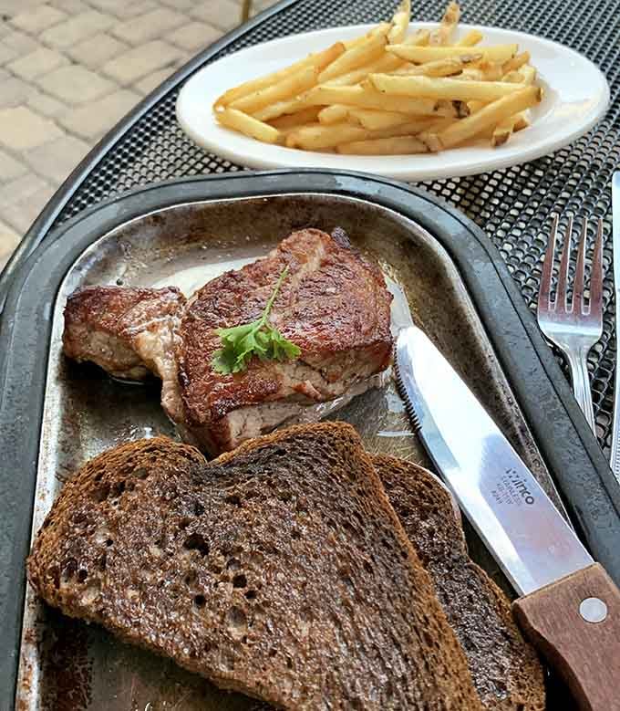 Golden fries, perfectly grilled steak, and toasted bread compose a symphony that would make Lawrence Welk tap his toes.