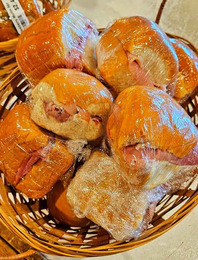 Ham biscuits wrapped and ready to go, proving that simple Southern comfort food never goes out of style.