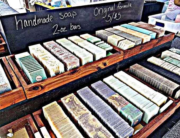 Handmade soap bars lined up like aromatic soldiers ready to wage war on your boring shower routine.
