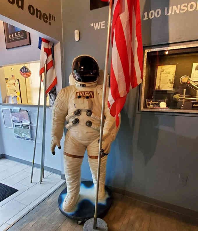 That NASA spacesuit standing at attention has seen more action than most of us will in a lifetime of adventures.