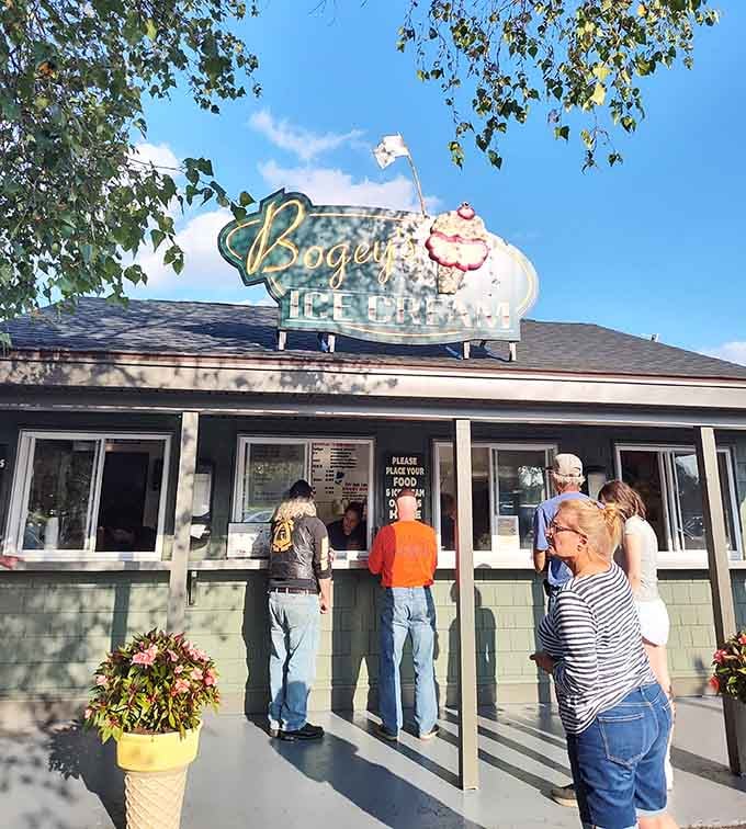 That vintage sign and the line of happy customers tell you everything about what's worth waiting for here.
