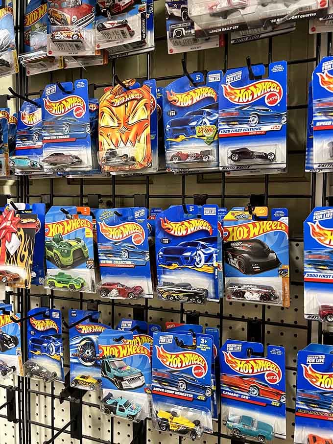 Vintage Hot Wheels still in packages, making grown adults suddenly remember their childhood bedroom floors with startling clarity.