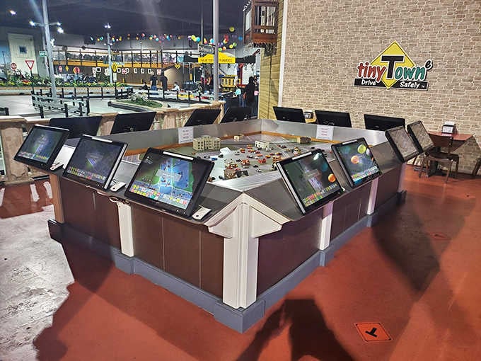 Interactive driving simulators let kids test their skills digitally before taking the wheel of actual miniature vehicles.