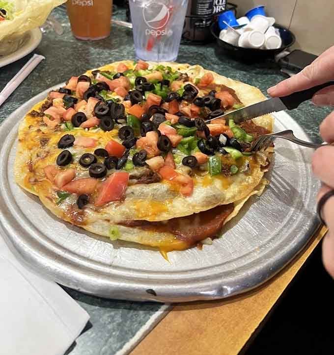 This Mexican pizza situation looks like someone took all your favorite things and said "yes" to everything simultaneously.