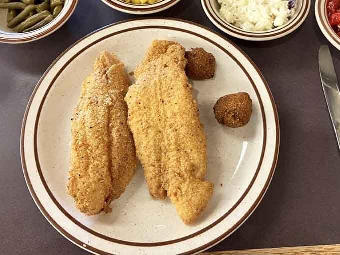 Cornmeal-crusted catfish filets with hush puppies, because sometimes you need to switch from land animals to water dwellers.