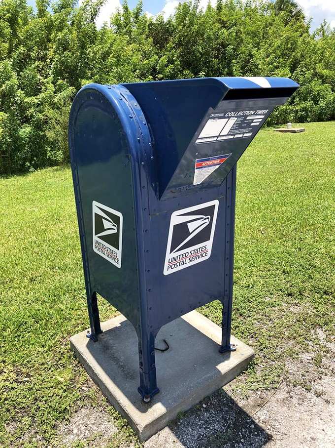 Even the mailbox outside maintains that classic blue charm, ready to send your postcards across the country.