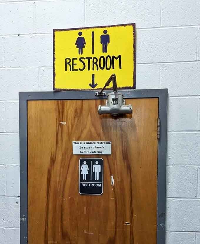Even the restroom signage has personality here, proving that book lovers appreciate good humor in unexpected places.