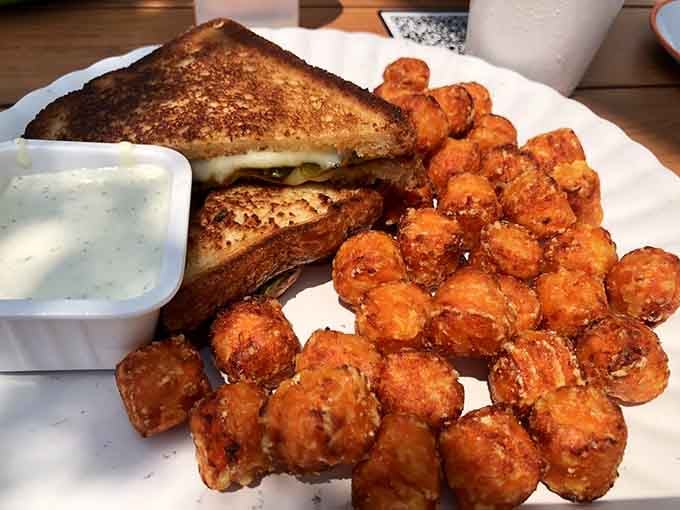 Grilled cheese meets sweet potato tots in a combination that answers questions you didn't know you had about happiness.