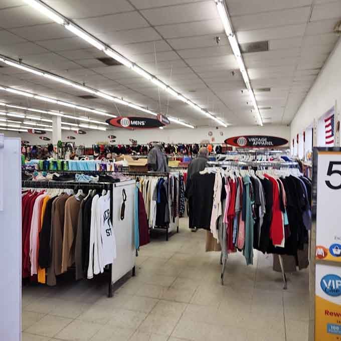 Men's clothing organized better than most department stores, proving thrift shopping has seriously upped its game these days.