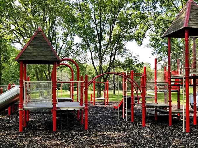 Bright red playground equipment proves that fun isn't just for the wilderness explorers in your family.