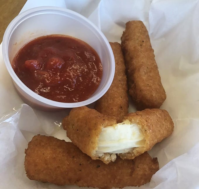 Golden mozzarella sticks with marinara sauce prove that sometimes simple pleasures are the best pleasures of all.