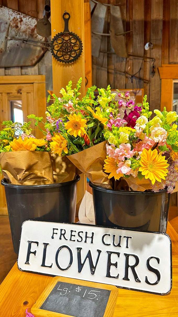 Fresh cut flowers bring a splash of color that makes the whole market feel alive.