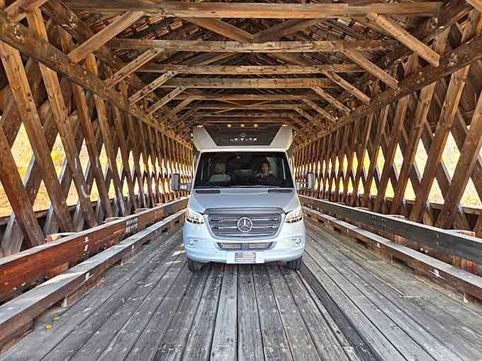 Modern vehicles fit just fine through this 19th-century passage, proving good design never goes out of style.