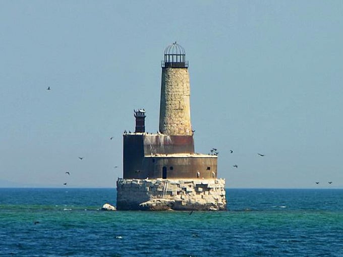 Birds have claimed the structure as their own, turning this abandoned lighthouse into prime waterfront real estate for seagulls.