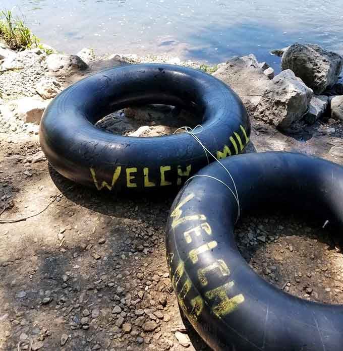 Battle-tested tubes bearing the Welch Mill name, veterans of countless peaceful river campaigns.