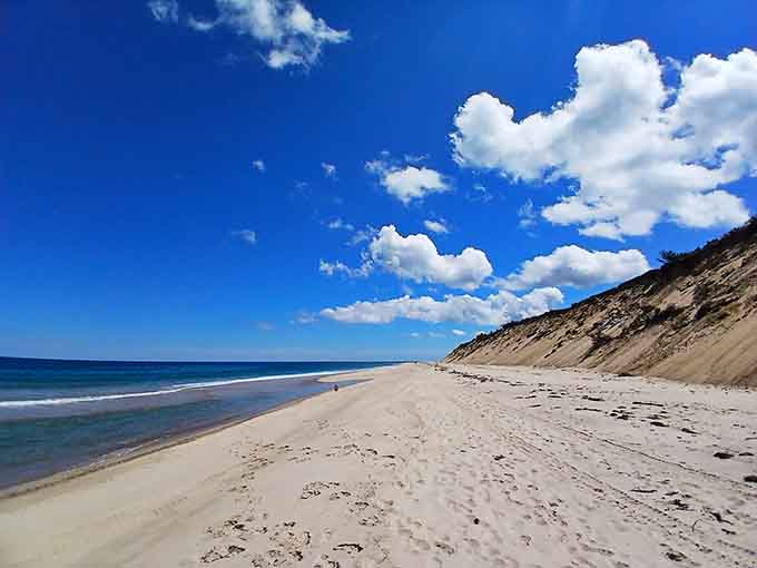 Dramatic cliffs frame this spectacular beach where the Atlantic puts on its best show daily.