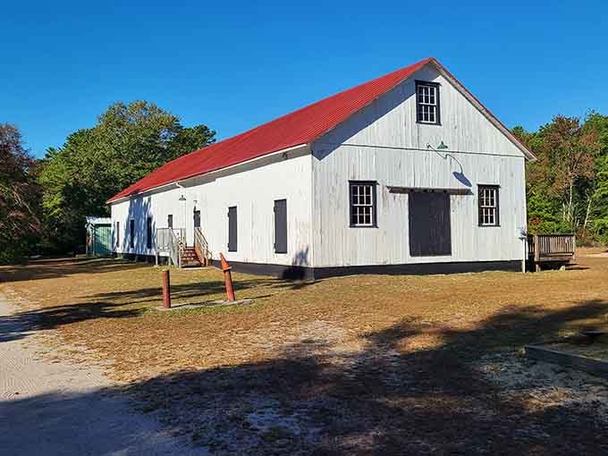The pristine packing house with its bright red roof looks ready to process berries just like yesterday.