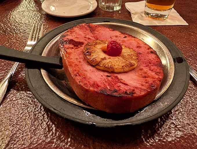 That glazed ham steak with pineapple brings sweet and savory together like a perfectly choreographed culinary dance number.