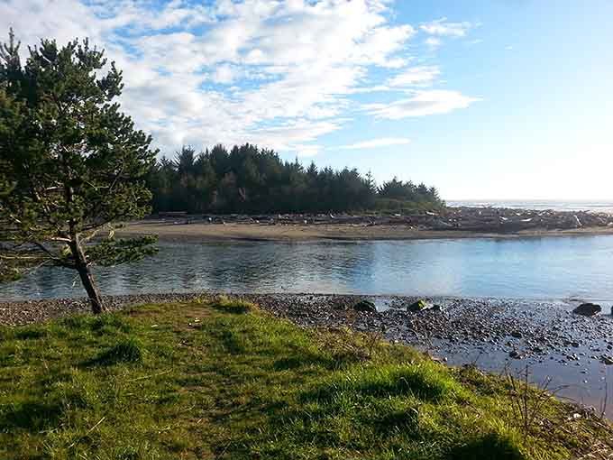 The Winchuck River flowing serenely toward the ocean, unbothered by the chaos of modern life.