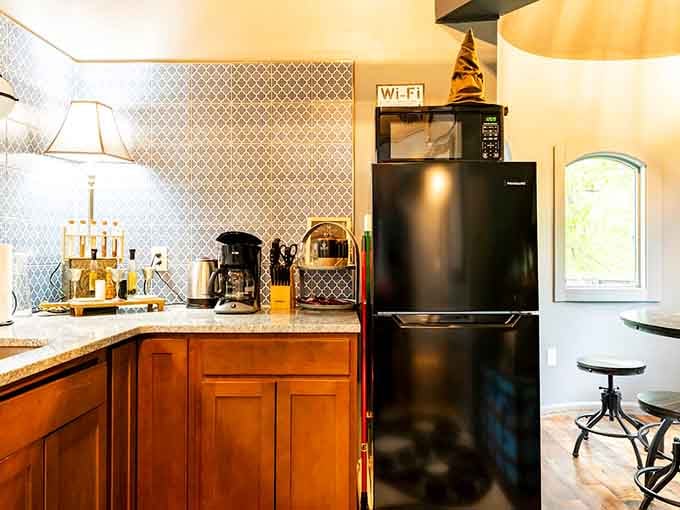 The Sorting Hat sits atop the fridge because even wizards need modern appliances and decent coffee makers.