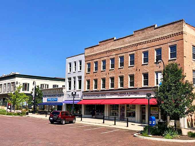 Brick storefronts housing actual local businesses, not another chain selling the same stuff you can get anywhere else.