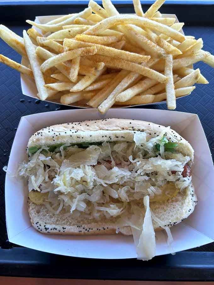 Sauerkraut piled high on a New York-style dog, because sometimes simple traditions are worth keeping around.