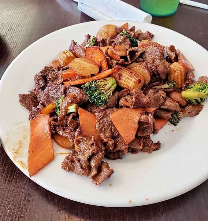 Hibachi steak loaded with vegetables shows that even your ambitious plate-piling can include something vaguely resembling nutritional responsibility.