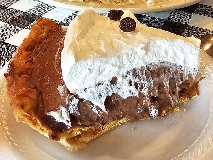 Chocolate cream pie with meringue peaks that belong in a museum. Art you can eat is the best art.