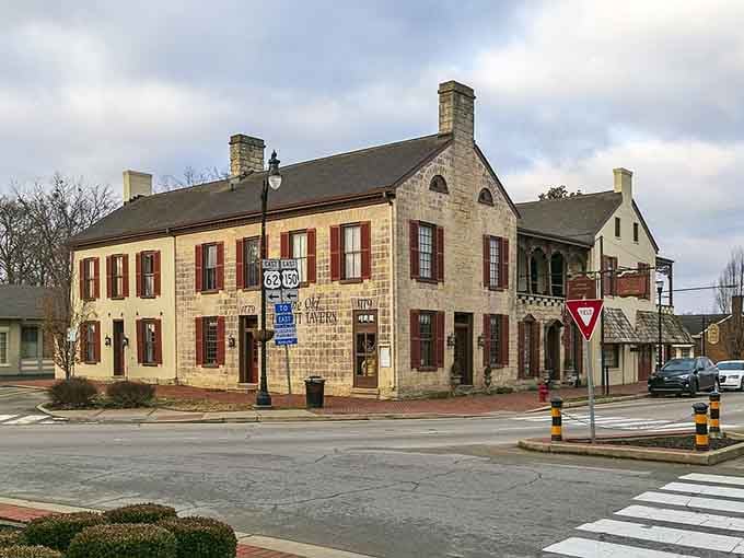That limestone tavern building has witnessed more history than most museums, standing strong at the crossroads since pioneer days.