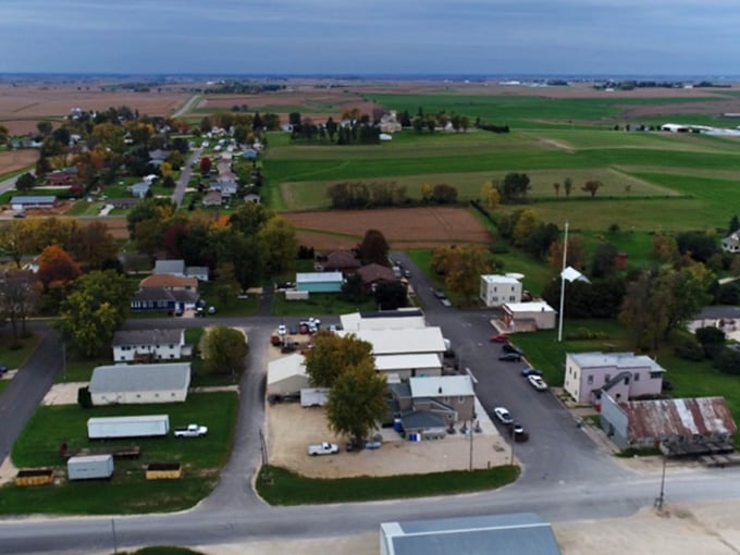 From above, Bellechester sits like a quiet quilt patch stitched between golden autumn fields and a wide Minnesota sky.